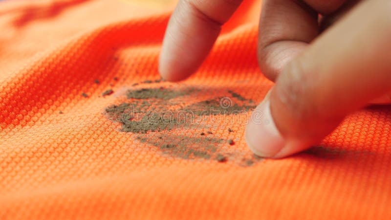 Removing Dirt Stains from Orange Fabric Easily at Home Stock Video ...