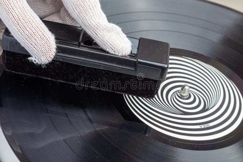 Removing Dust from the Vinyl Record Using a Velvet Brush Stock Photo ...