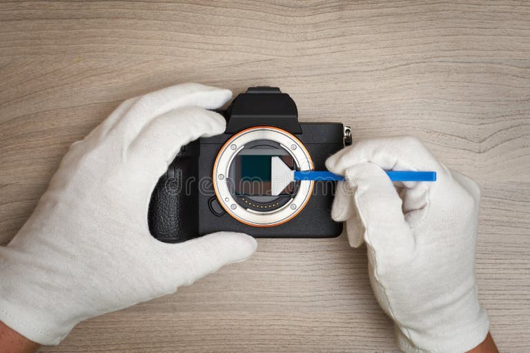 Removing sensor dust stock photo. Image of cleaning - 224916876