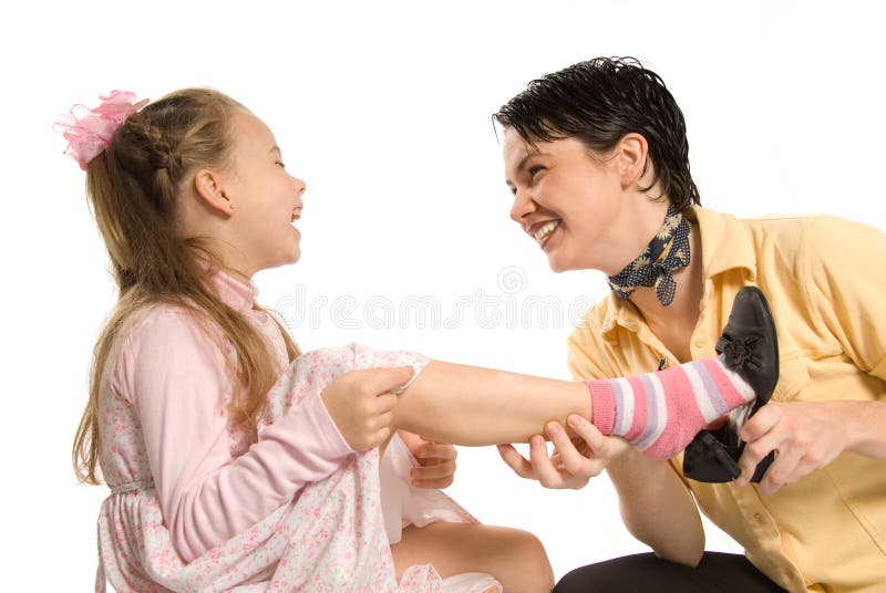 Removing shoe stock photo. Image of laughing, sister, tickle - 1497058