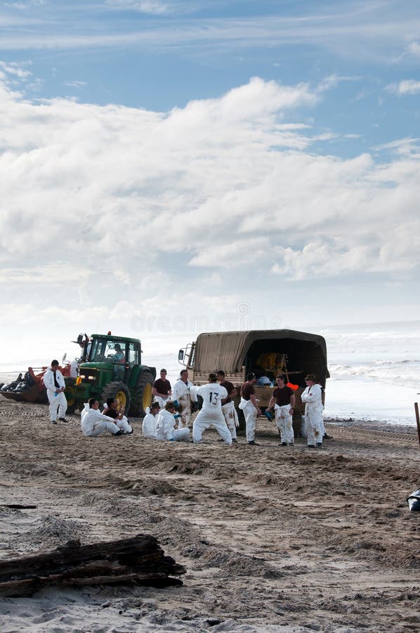 Rena Oil Spill Clean Up Workers Editorial Stock Photo - Image of army ...