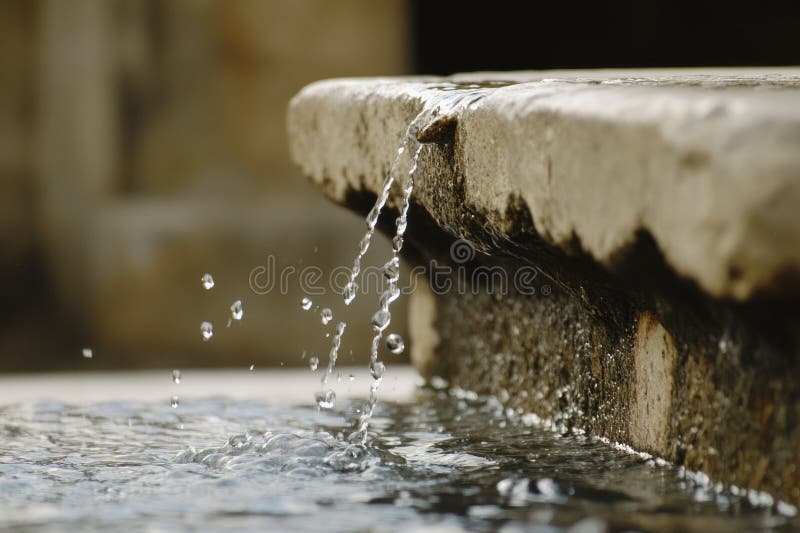 Renaissance Stone Fountain Pouring Water into Basin on Stone Wall Stock ...
