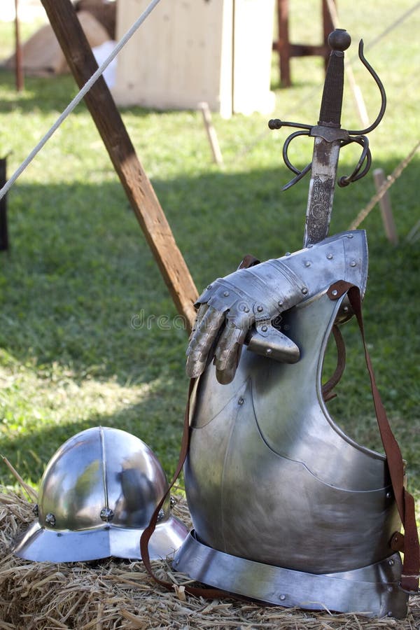 Renaissance Weapons and Armors in the Grass Lawn. Stock Photo - Image ...