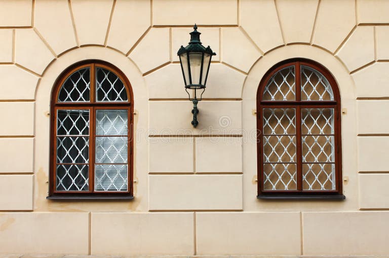Renaissance Windows with Iron Street Lamp Stock Photo - Image of shaped ...