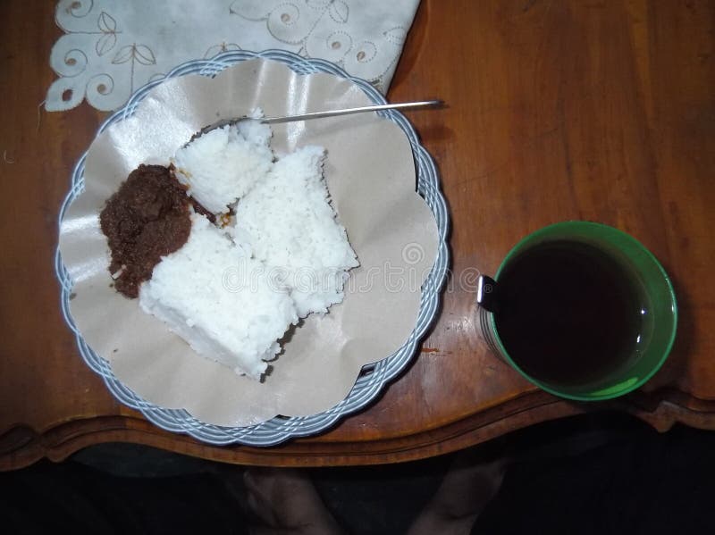 Rendang Rice with Tea stock image. Image of dessert - 221764493