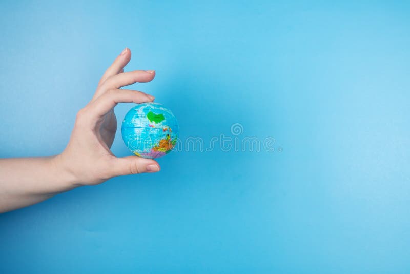Renewable Energy , Ecology Concept, Environmental Care, Hand with Globe ...