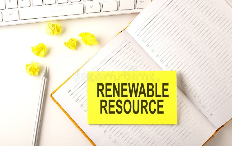 RENEWABLE RESOURCE Text on Sticker on the Diary with Keyboard and ...