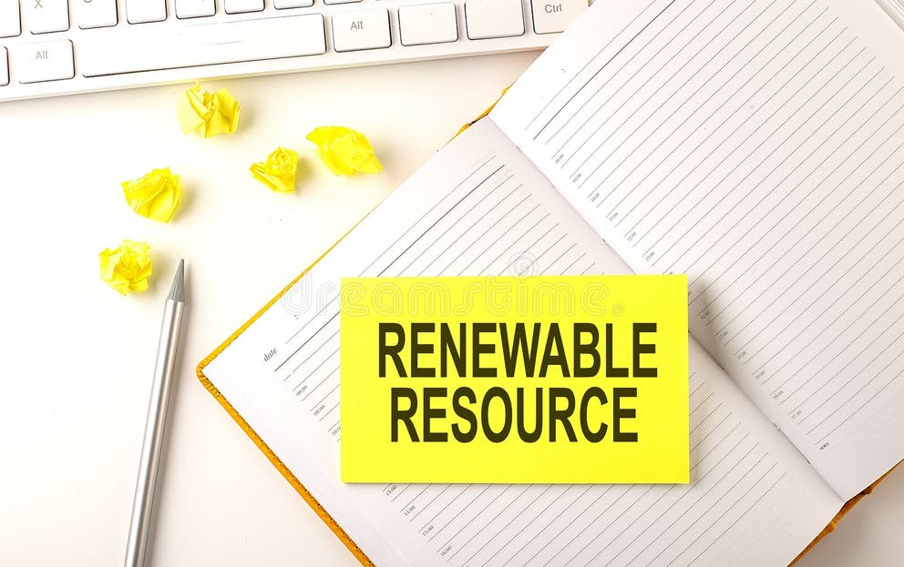 RENEWABLE RESOURCE Text on Sticker on the Diary with Keyboard and ...