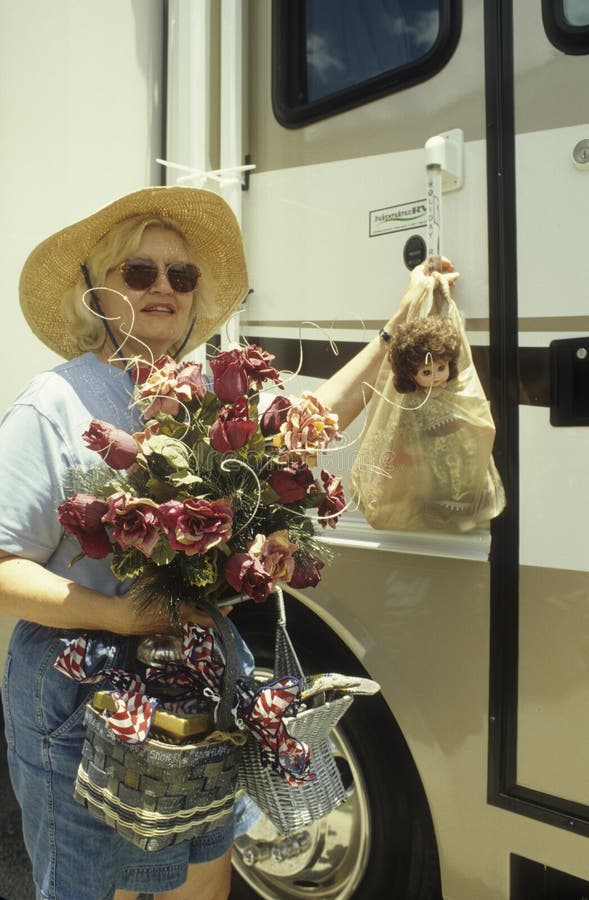 Renninger S Flea Market Shopper Stock Image - Image of silk, flowers ...