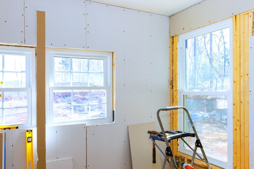 Renovation Activity in a Bright Room with Windows and Unfinished ...