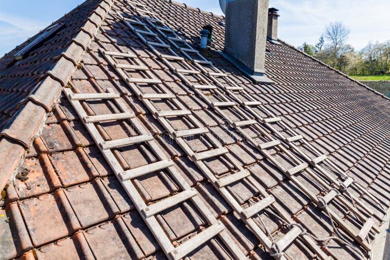 Renovation of a Brick Tiled Roof Stock Photo - Image of builder ...