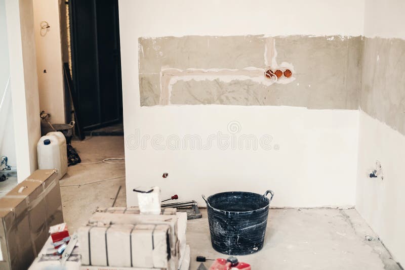 Renovation Concept. Tools Cement Boxes Baskets in Renovating Room ...