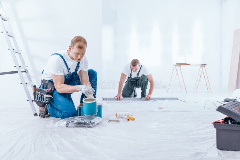Professional House Painter at Work Prepares the Wall Paint Stock Image ...