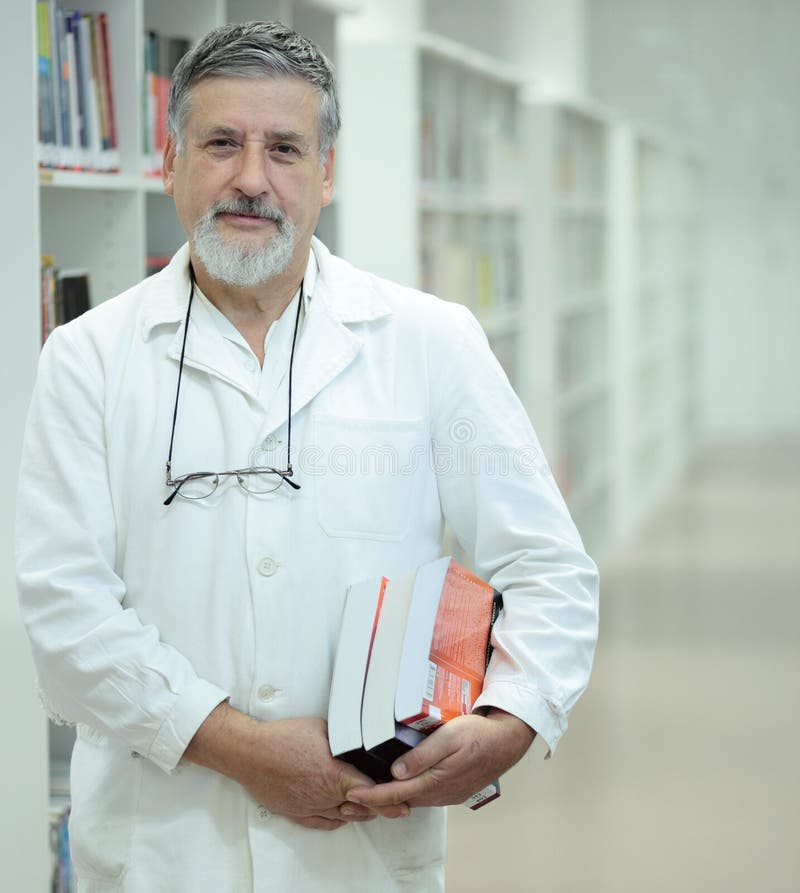 Renowned Scientist/doctor in a Library Stock Photo - Image of chemistry ...