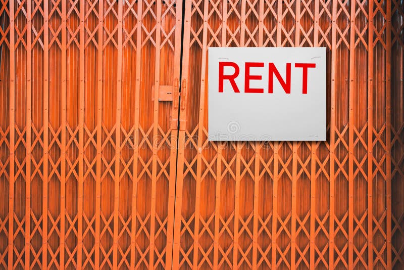 For Rent Sign in Front of Old Store Door Stock Photo - Image of real ...
