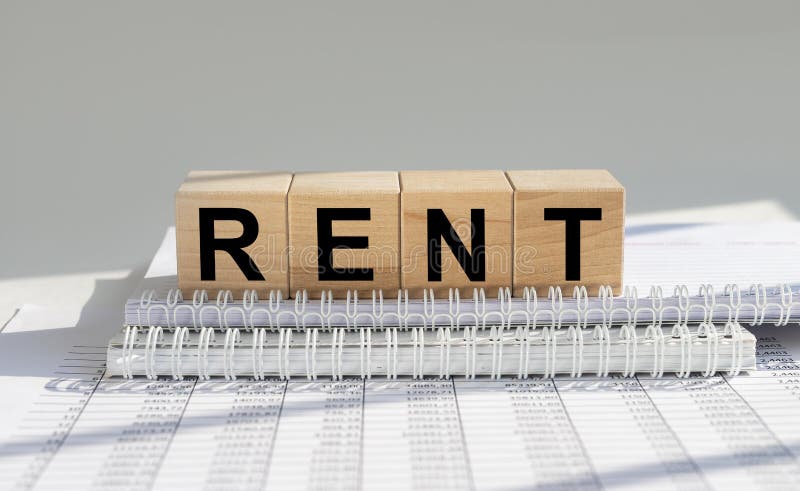 RENT Word on Cube Blocks on Office Table Close Up Stock Image - Image ...