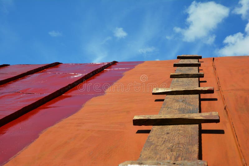 Repainting Red Metal Roof. Repainting Old Metal Roof Surface Stock ...