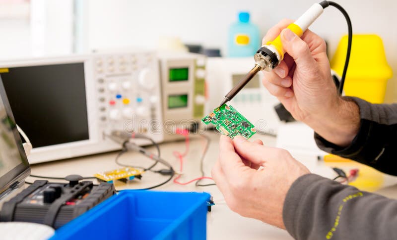 Repair and Adjustment the Electronic Device Stock Photo - Image of ...