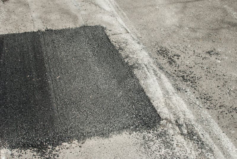 Repair asphalt patch stock photo. Image of pothole, industrial - 217094546