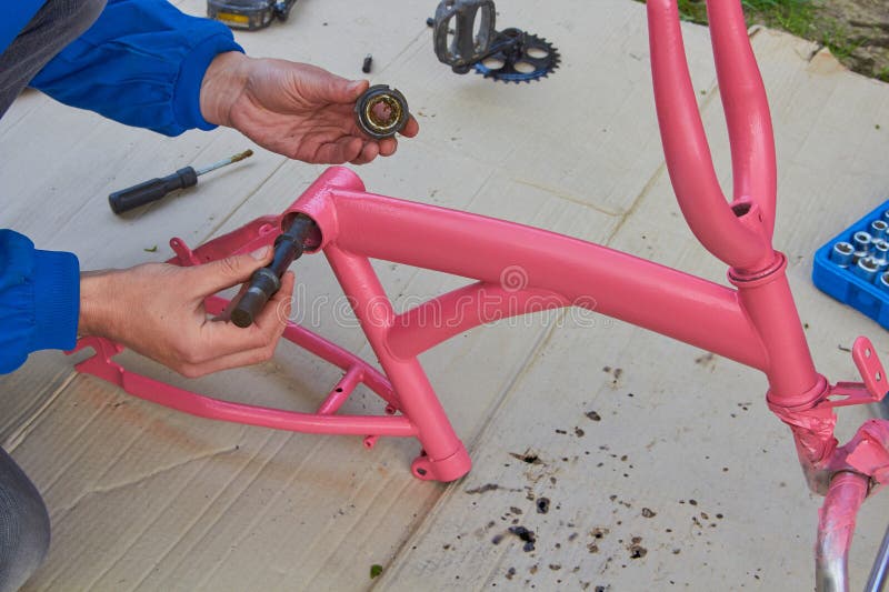 Repair a Bicycle for a Child,bike Workshop, Pink Bike Assembly, Bike ...