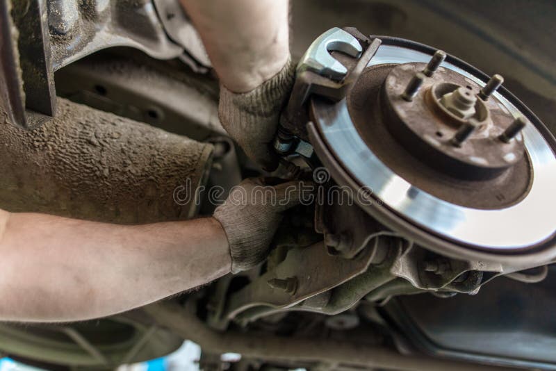Repair of Brake System on Car Wheels Stock Photo - Image of spring ...