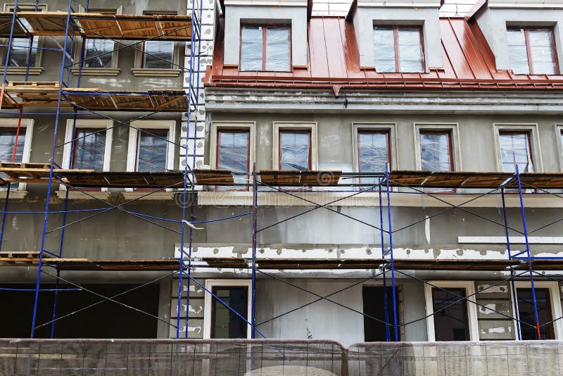 Repair of building facade stock photo. Image of industry - 92069798