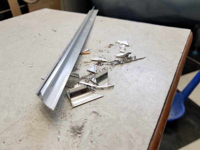 Repair - Building with Tools and Aluminum Angle with Cutlets on the Tab ...