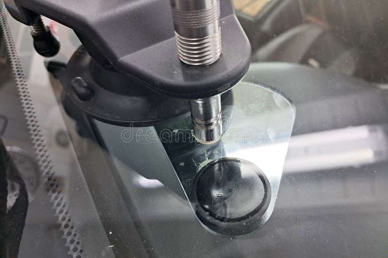 Repair of a Chip on the Windshield of the Car. Repair of Cracks Stock ...