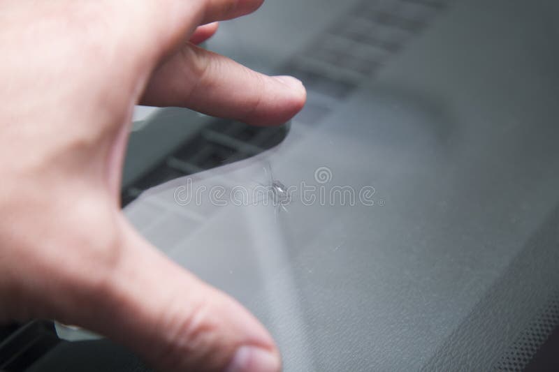 Repair of Chips and Cracks on the Windshield of the Car Stock Photo ...