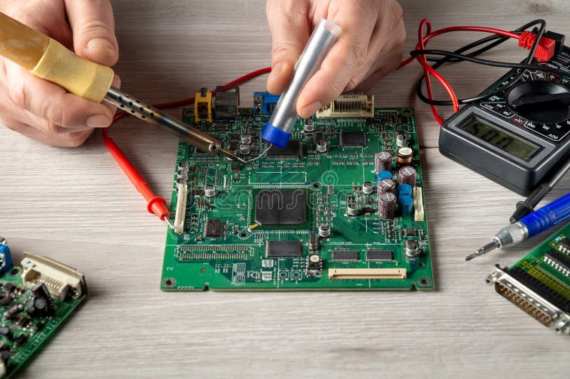 Repair of Computers or Electronics by a Foreman in a Workshop. Computer ...
