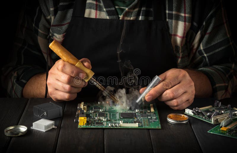 Repair of Computers or Electronics by a Foreman in a Workshop. Computer ...