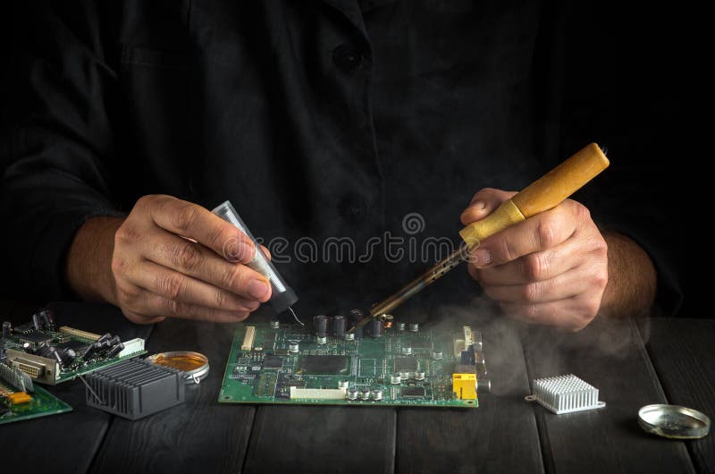 Repair of Computers or Electronics by a Foreman in a Workshop ...