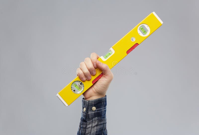 Close Up of Builder`s Hand Holding Building Level Stock Image - Image ...