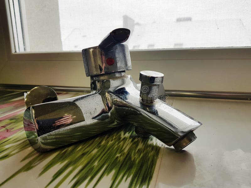 Repair and Construction - Water Tap on a Tile in the Bathroom Stock ...