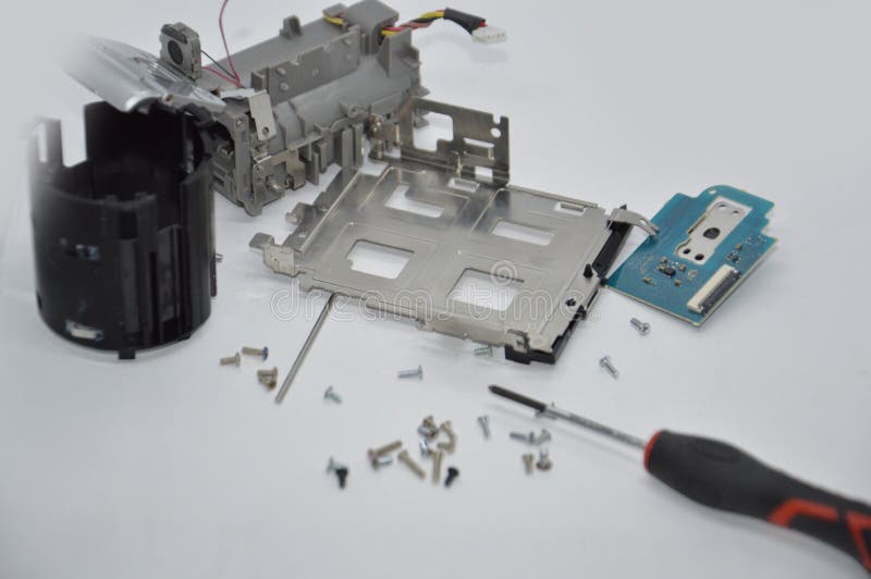 Repair and Disassembly of a Digital Camera Stock Image - Image of optic ...