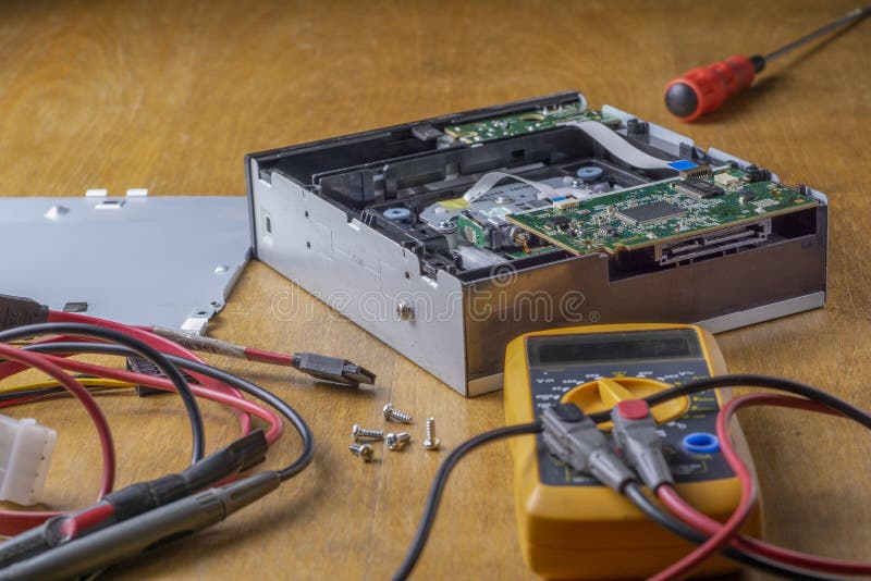 Repair of a DVD player. stock photo. Image of equipment - 234392358