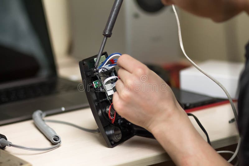Repair of Electrical Appliances with a Soldering Iron. Close Up Stock ...