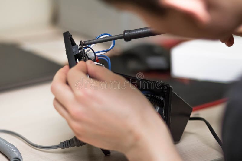 Repair of Electrical Appliances with a Soldering Iron. Close Up Stock ...