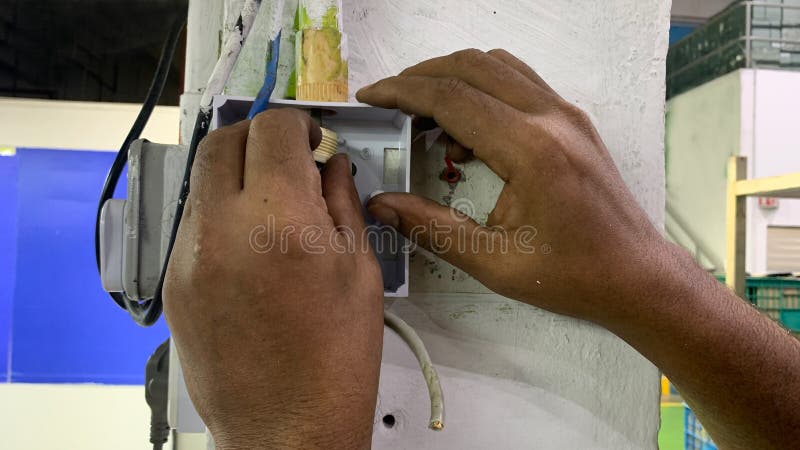 Repair Electrical.man at Work on Switches and Sockets Stock Image ...