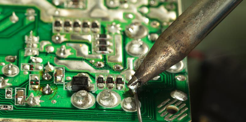 Repair Electronic Circuit Board with Soldering Iron Stock Image - Image ...