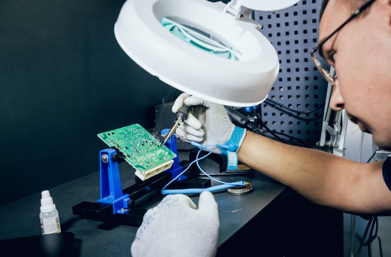 Repair of Electronic Devices, Soldering and Circuit Board Stock Photo ...