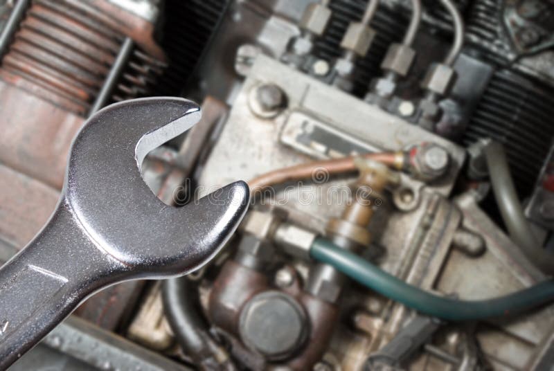 Repair of the Engine. a Hand with the Tool Stock Photo - Image of ...