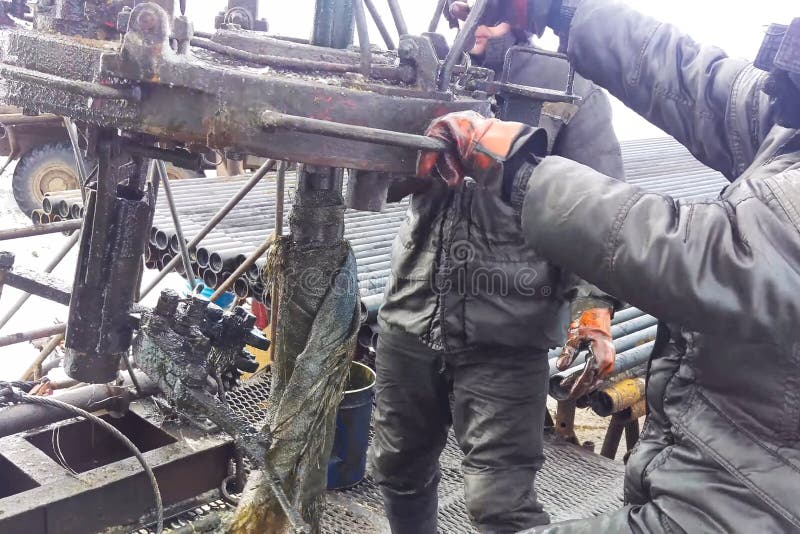 Repair of Equipment at the Rig Stock Photo - Image of blue, derrick ...