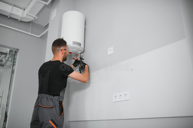 Repair of a gas boiler stock photo. Image of construction - 333814544