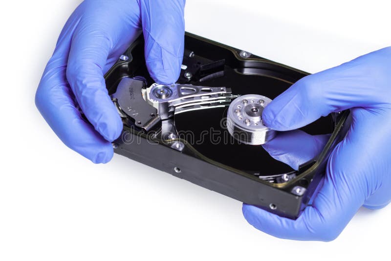 Repair Hard Disk. Hands of Master in Gloves Repair the Computer Hard ...