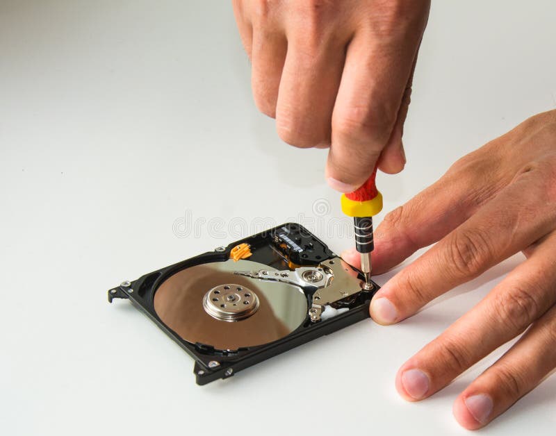 Fixing HDD Using Screwdriver Stock Photo - Image of electronic ...