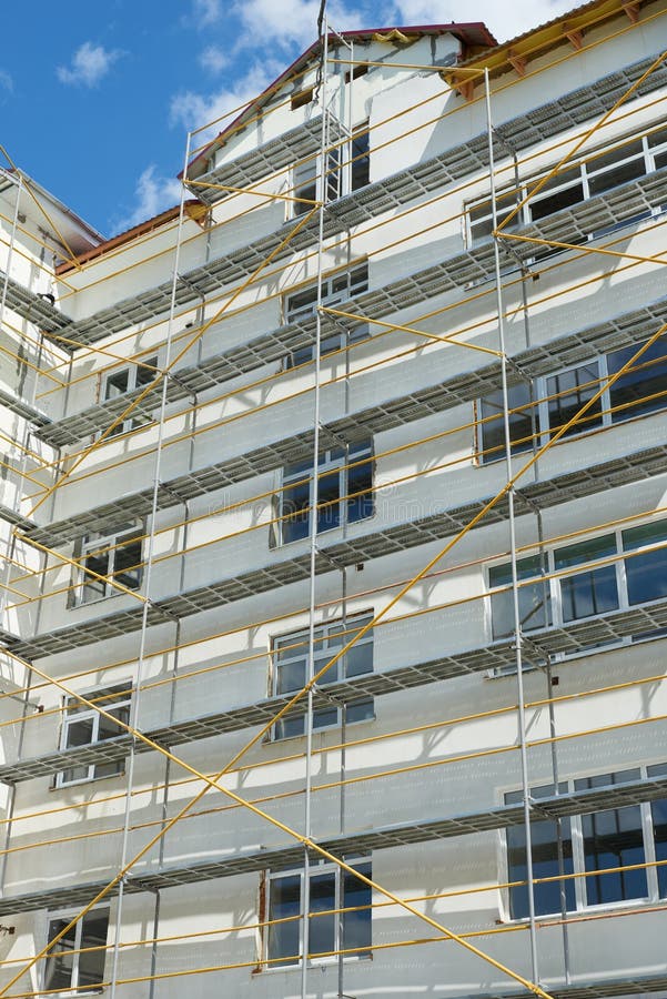 Repair home scaffolding stock photo. Image of plaster - 55016648