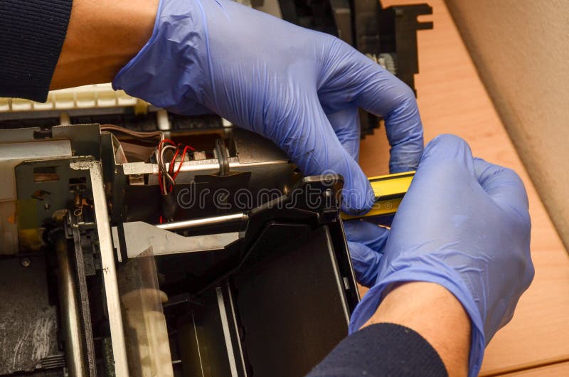 Inkjet Printer Repair Engineer Stock Photos - Free & Royalty-Free Stock ...