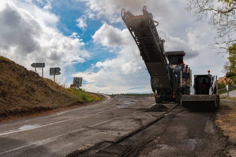 Repair and Maintenance Work on a Road with Machinery Stock Image ...