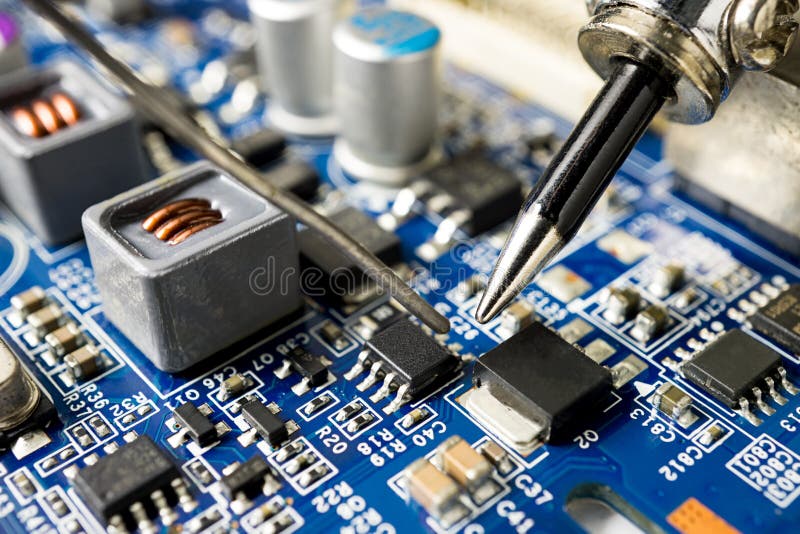 Repair Microchip with Soldering Iron and Tin Stock Image - Image of ...